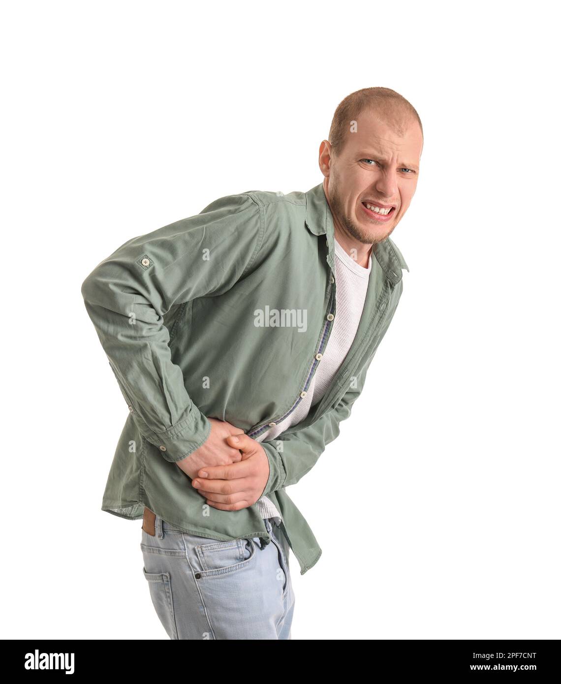 Young man with appendicitis on white background Stock Photo - Alamy