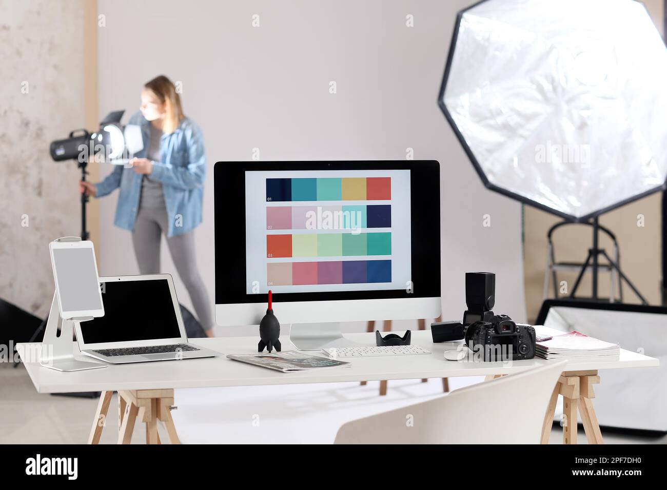 Photographer's workplace with devices in studio Stock Photo - Alamy