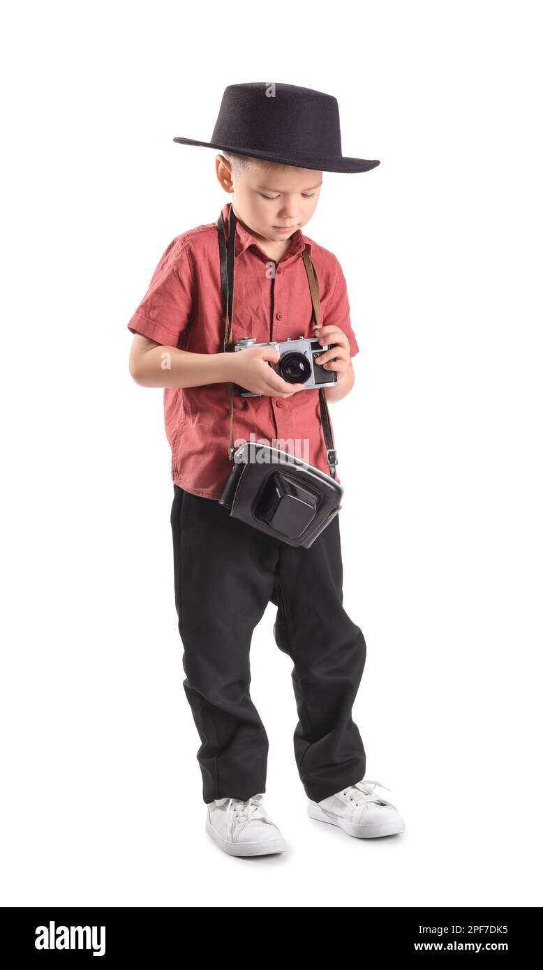 Cute little photographer with camera on white background Stock Photo ...