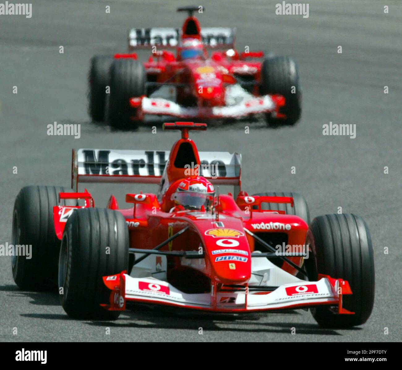 Ferrari team drivers Michael Schumacher of Germany leads Brazilian team ...