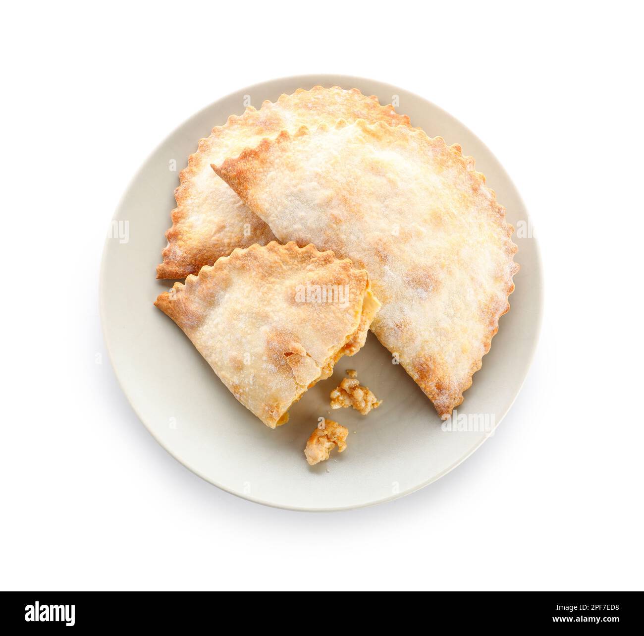 Plate with baked meat empanadas on white background Stock Photo - Alamy
