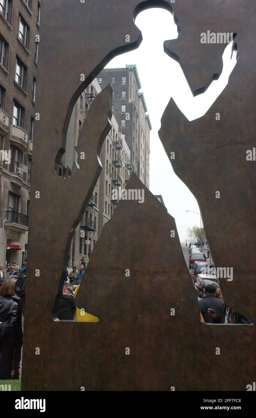 "The Invisible Man" sculpture stands in front of the longtime home of ...