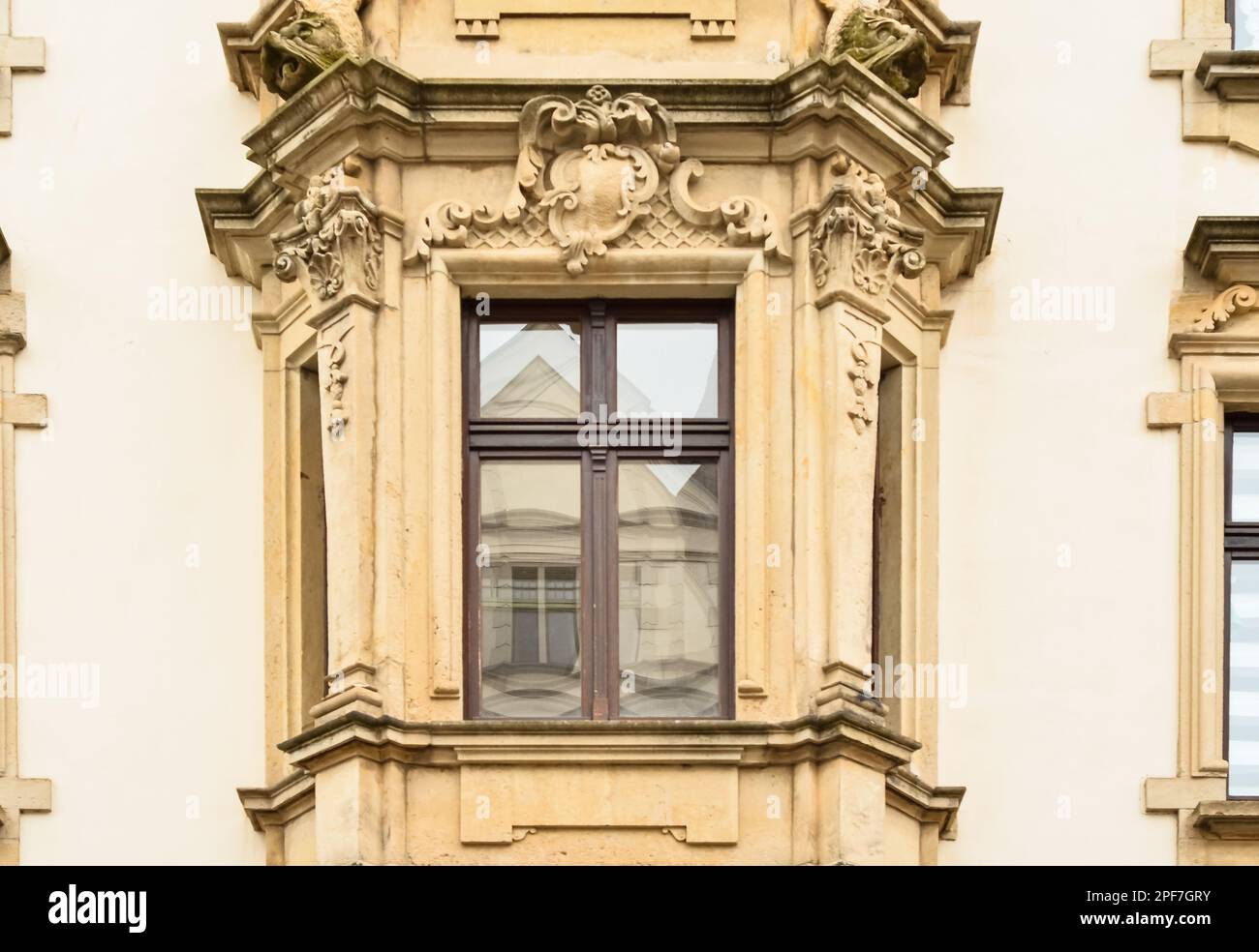 View of old building with wooden window Stock Photo - Alamy