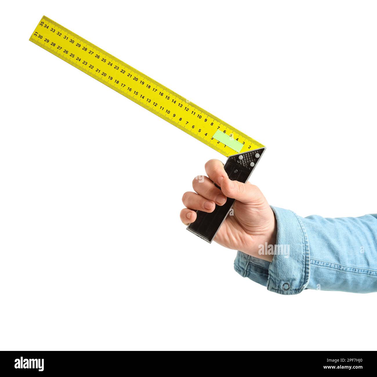 Worker with ruler on white background Stock Photo - Alamy