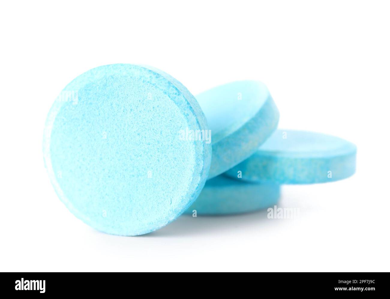 Blue soluble tablets isolated on white background Stock Photo - Alamy