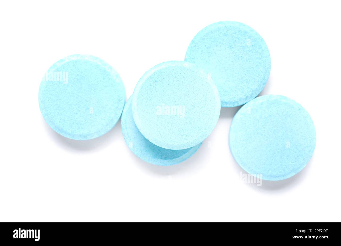 Blue soluble tablets isolated on white background Stock Photo - Alamy