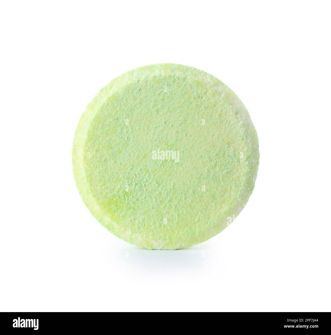 Green soluble tablet isolated on white background Stock Photo - Alamy