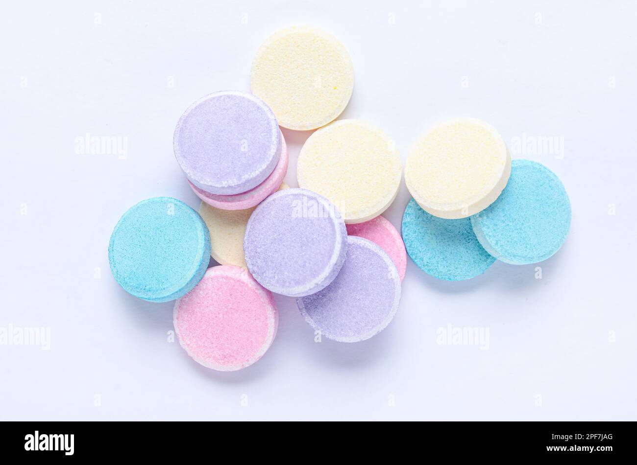 Colorful soluble tablets isolated on white background Stock Photo - Alamy