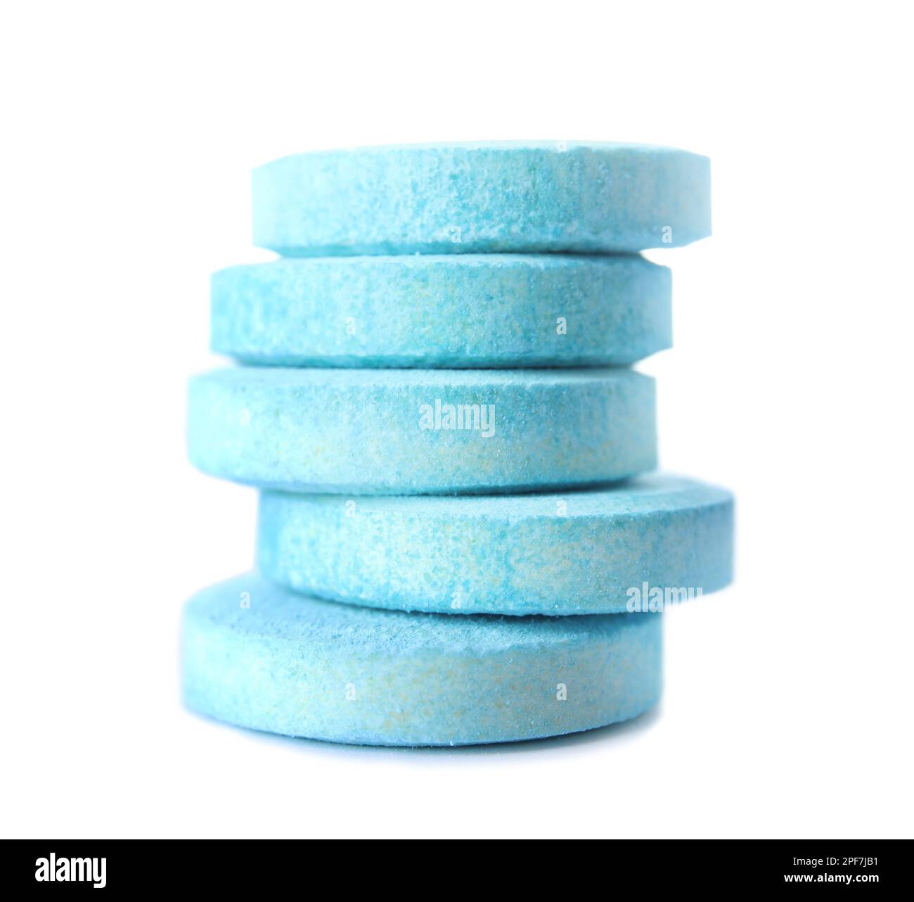 Stack of blue soluble tablets isolated on white background Stock Photo ...
