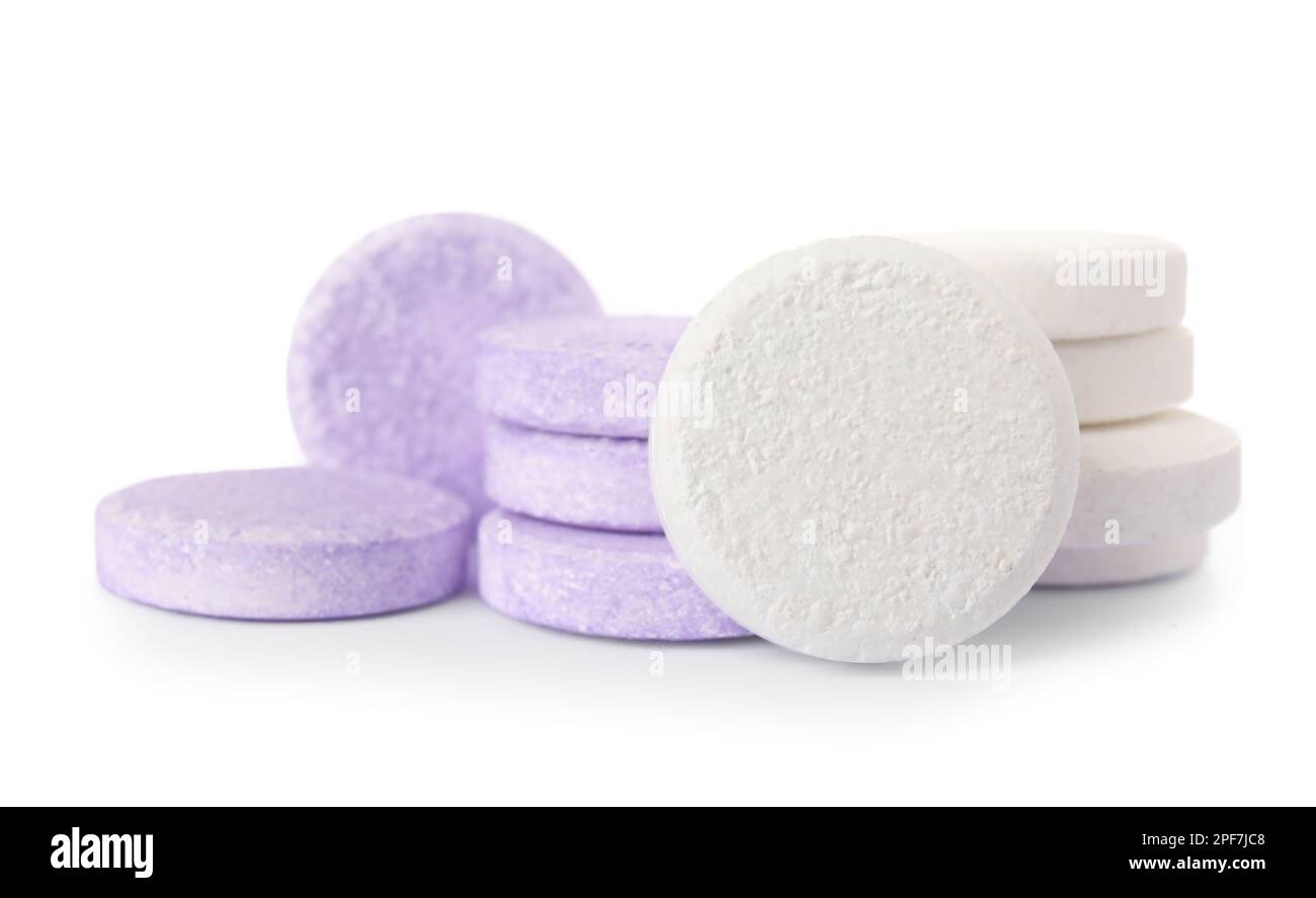 Colorful soluble tablets isolated on white background Stock Photo - Alamy