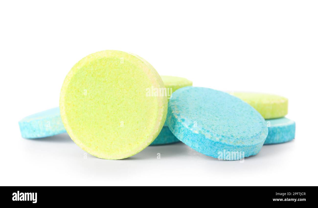 Blue and green soluble tablets isolated on white background Stock Photo ...