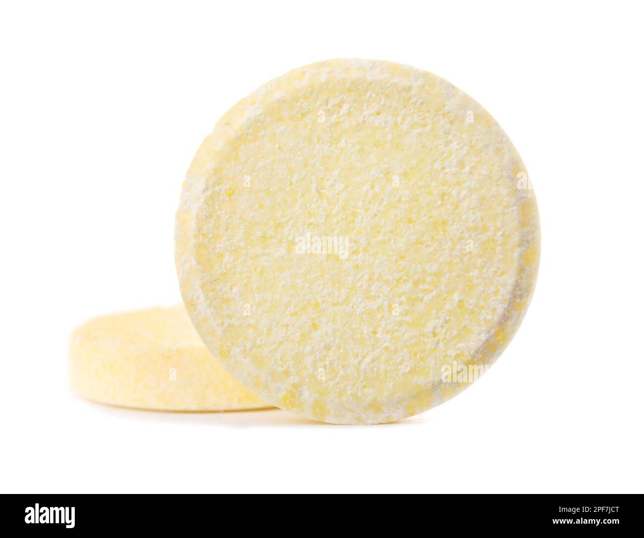 Yellow soluble tablets isolated on white background Stock Photo - Alamy