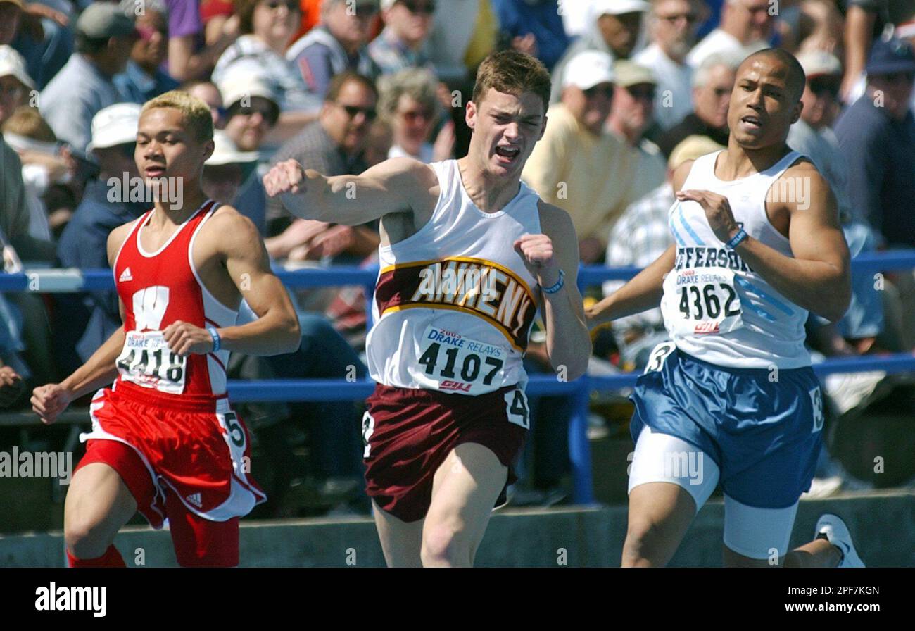 Ankeny's Andy Brodell, center, celebrates between Cedar Rapids ...
