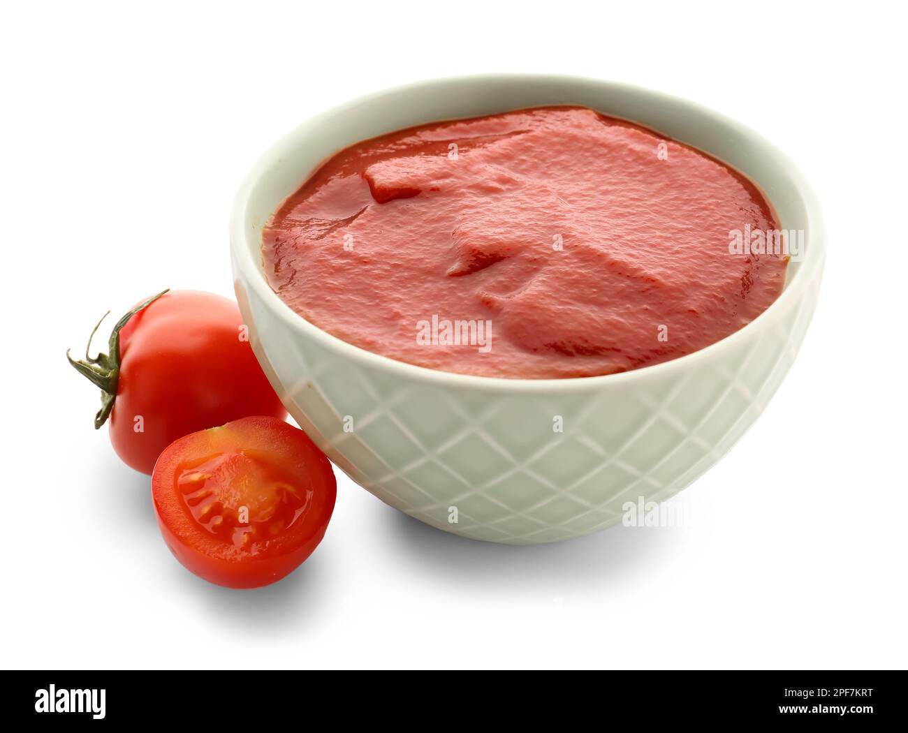 Bowl of tasty tomato paste isolated on white background Stock Photo - Alamy