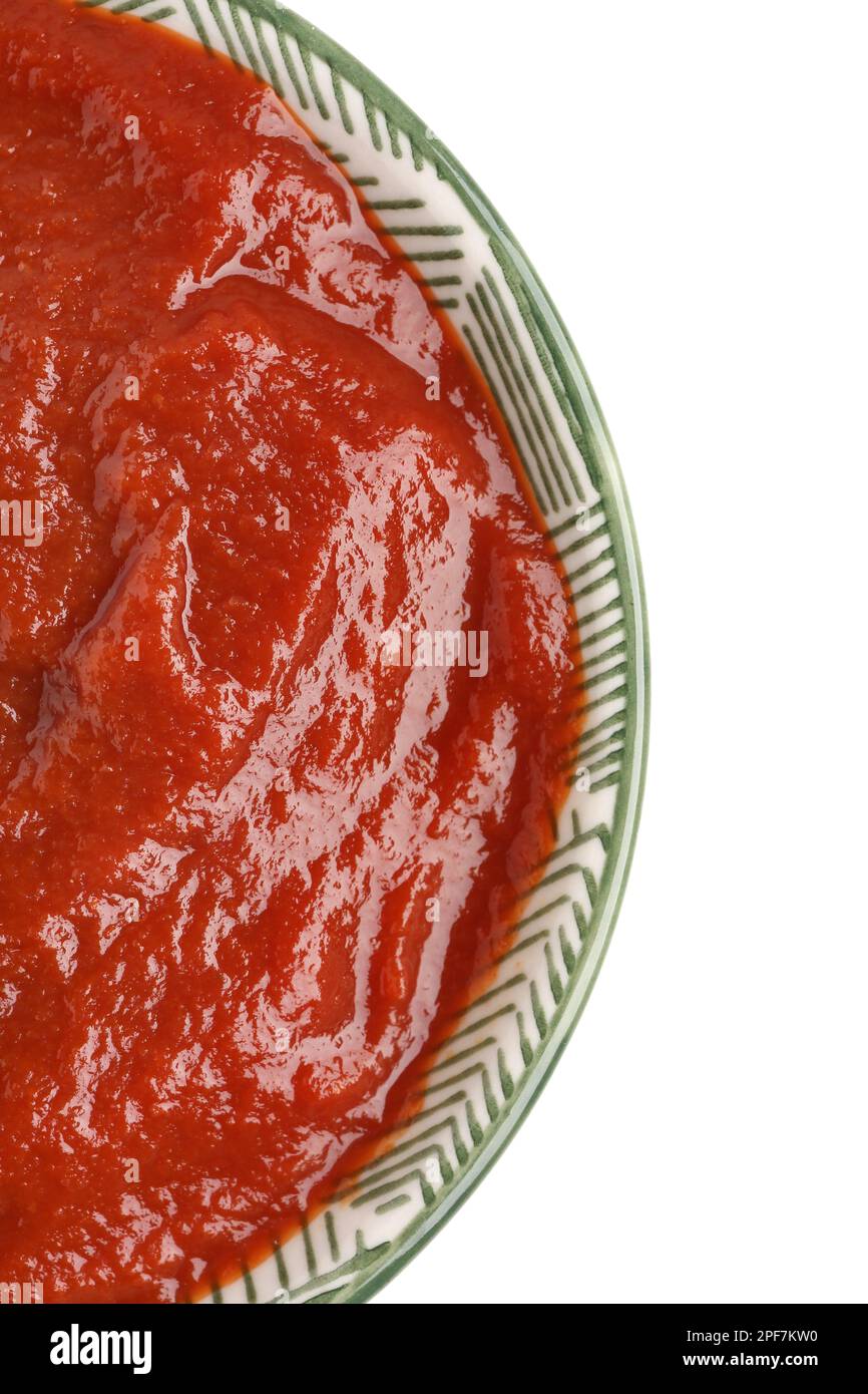 Bowl of tasty tomato paste isolated on white background Stock Photo - Alamy