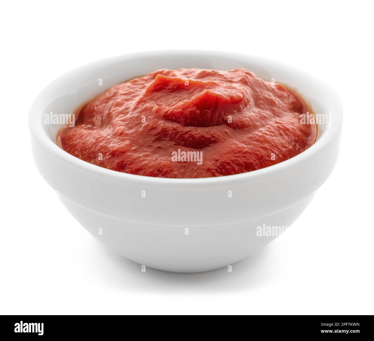 Bowl of tasty tomato paste isolated on white background Stock Photo - Alamy