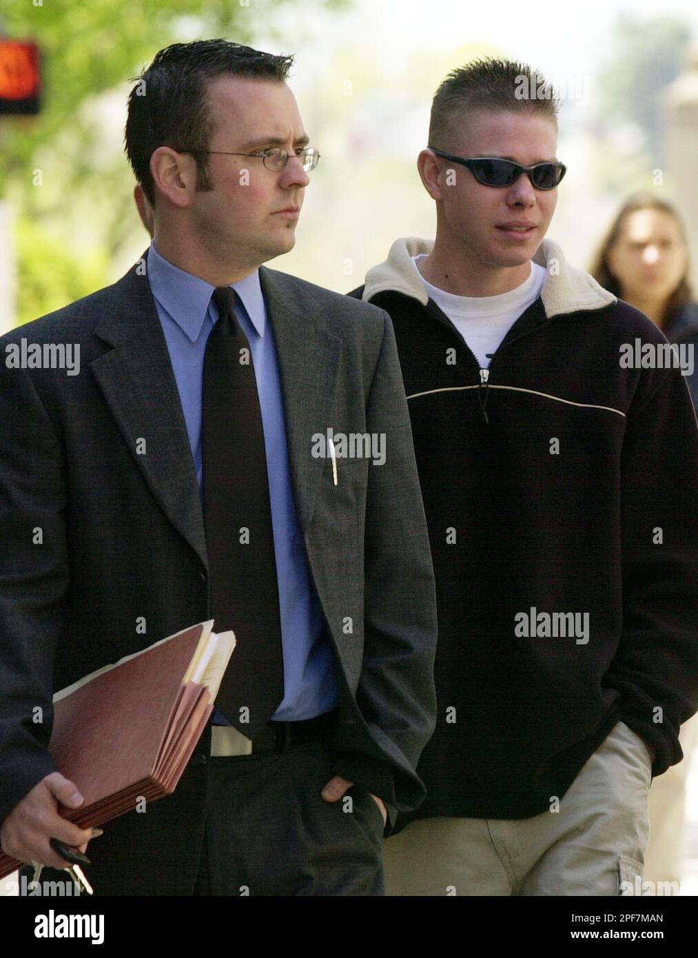 Boyd Knouse, right, arrives for his hearing at the Dauphin County Court ...