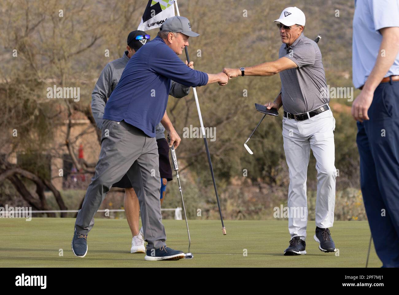 Captain Phil Mickelson of HyFlyers GC fist bumps pro-am participant Tom ...