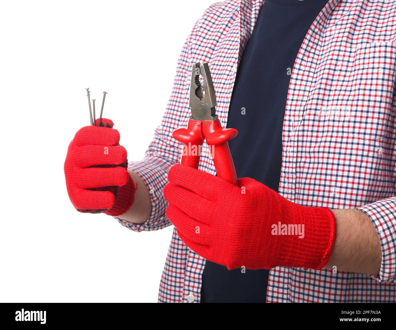 Man in gloves holding pliers and nails on white background Stock Photo ...