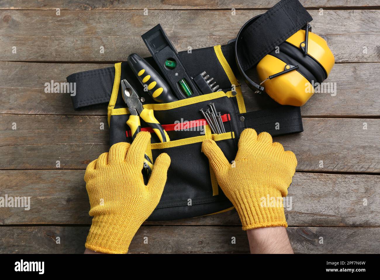 Hands different tools in gloves hi-res stock photography and images - Alamy