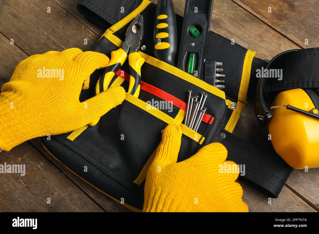 Hands different tools in gloves hi-res stock photography and images - Alamy