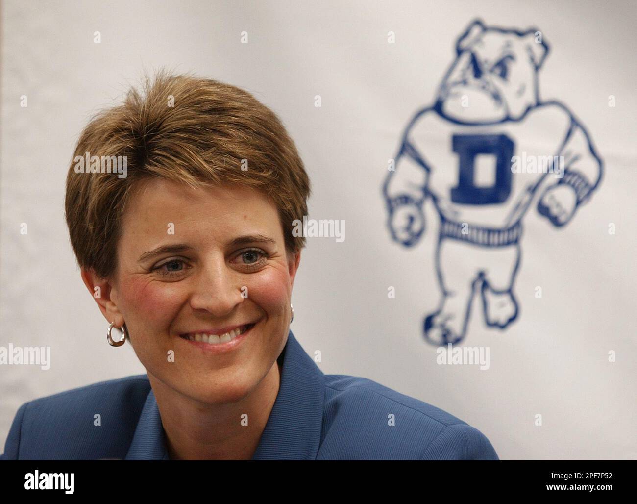Amy Stephens smiles as she is introduced as the new women's basketball ...