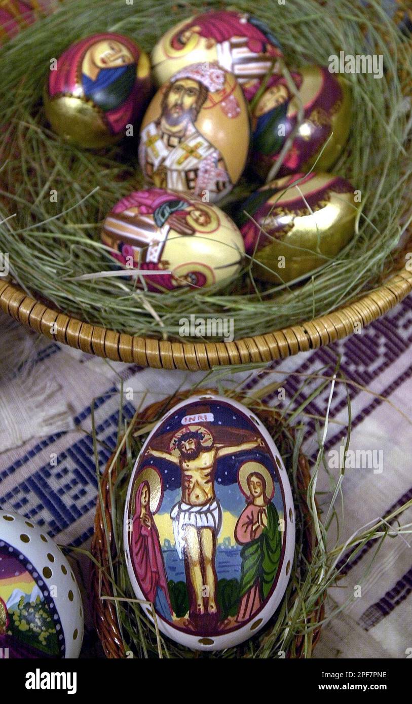 Easter eggs painted with religious motifs by artists from the north of ...
