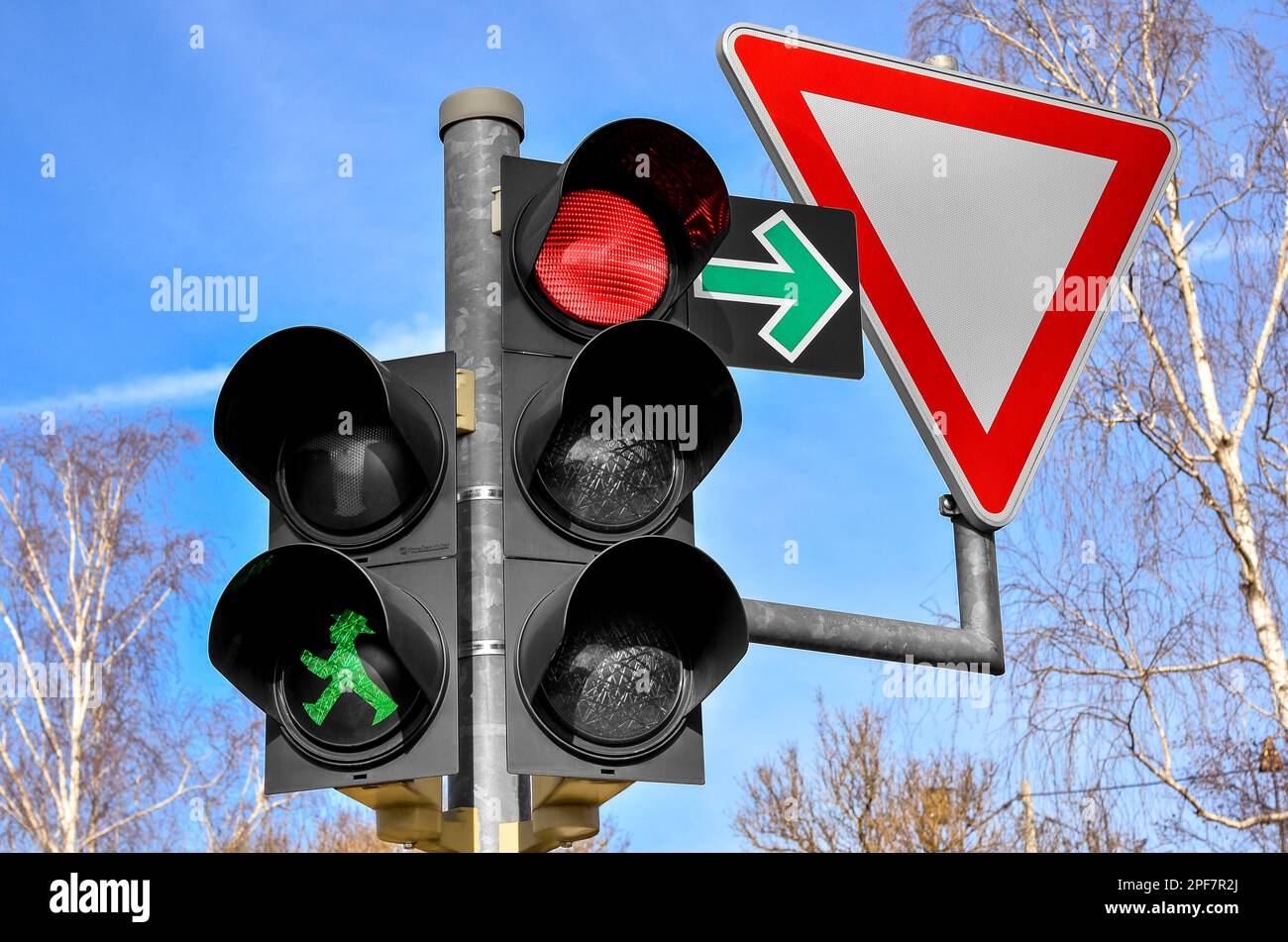 View of traffic lights with signs in city, closeup Stock Photo - Alamy