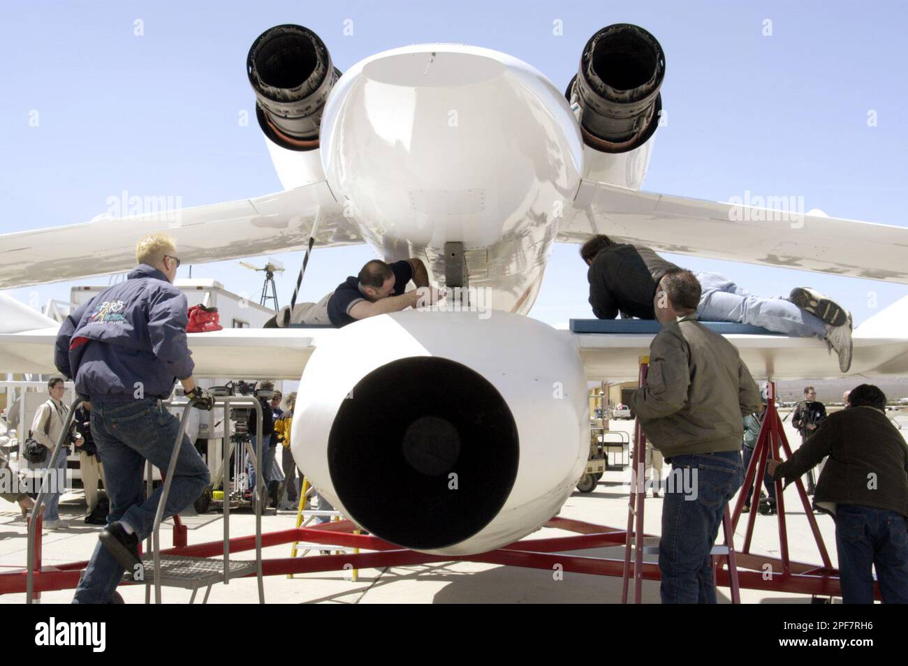 The White Knight, top, is attached to a rocket that will power the ...