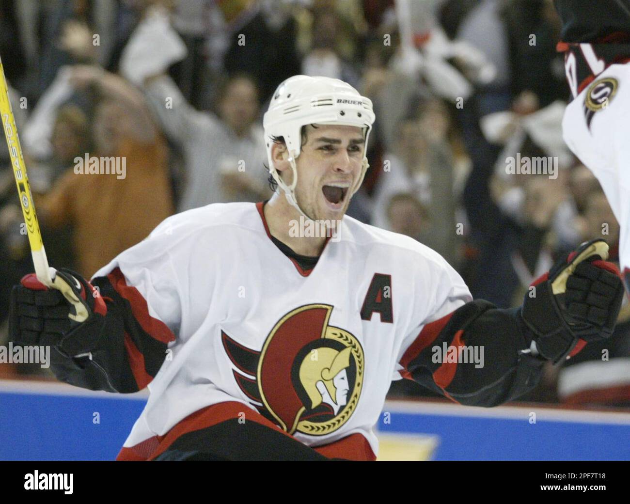 Ottawa Senators Wade Redden celebrates teammate Radek Bonk's goal ...