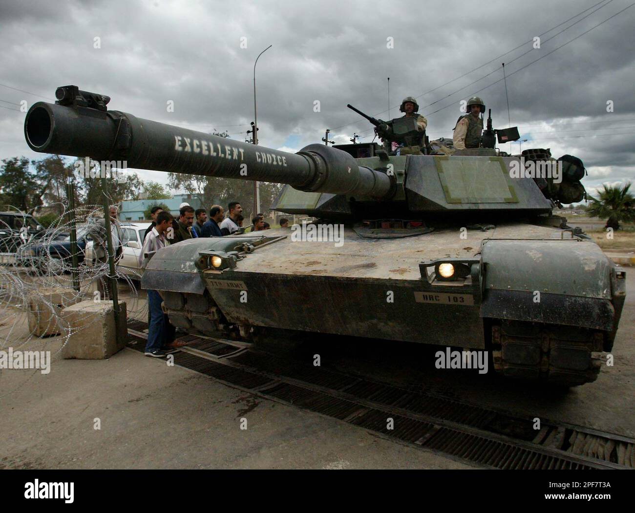 A United States Army M-1 tank arrives back from a patrol to the former ...