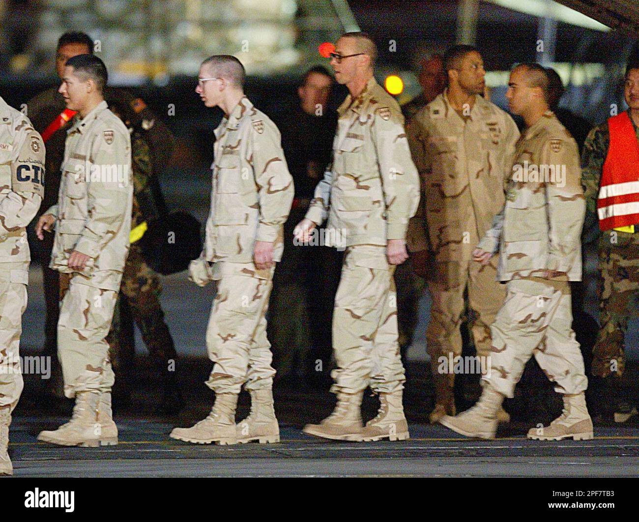 ** ADDS IDENTIFICATION OF PFC. MILLER ** Former POWs, from left to ...