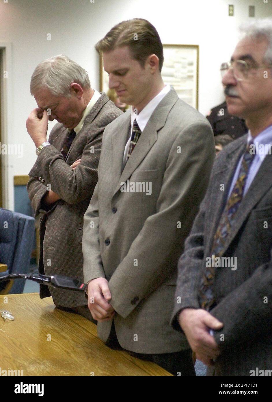 Christian Longo, center, bows his head as he is sentenced to death by ...