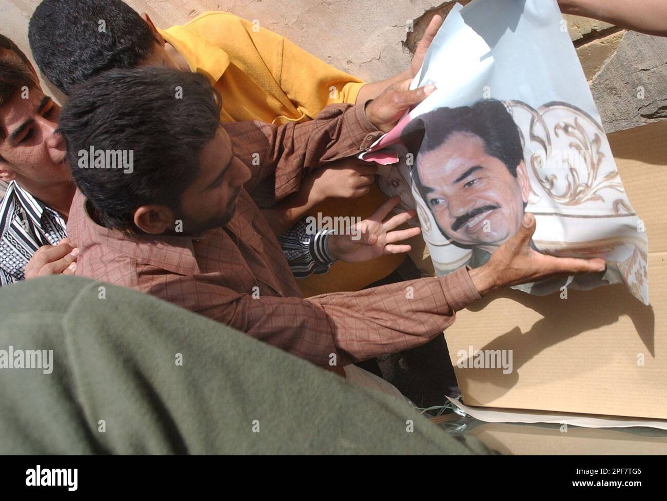 As soldiers of the U.S. Army Special Forces and U.S. Marines clear a ...