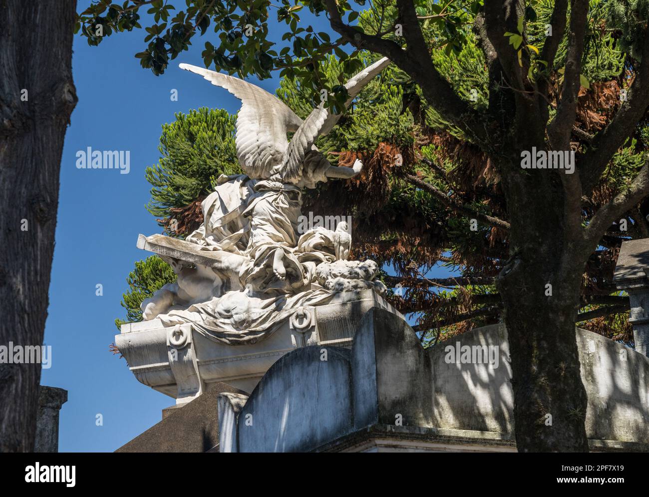 Angel carving above burial vaults and mausoleums in La Recoleta ...