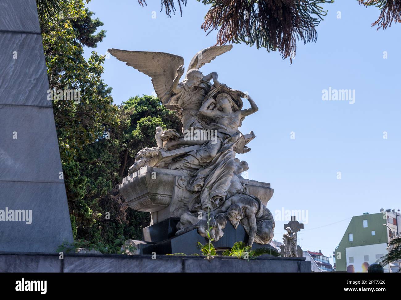 Angel carving above burial vaults and mausoleums in La Recoleta ...