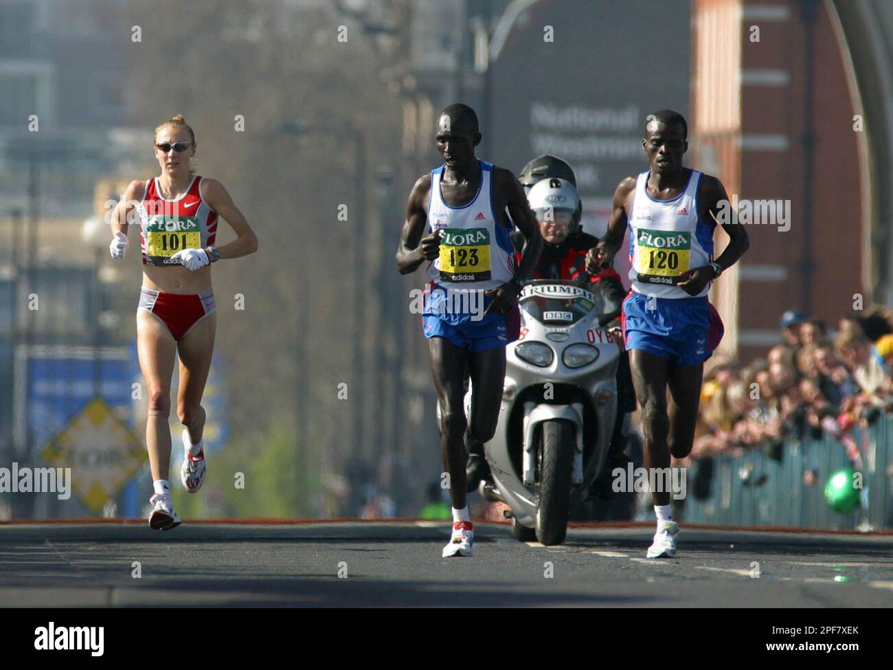 Paula Radcliffe, left, runs over London's Tower Bridge alongside Kenyan ...