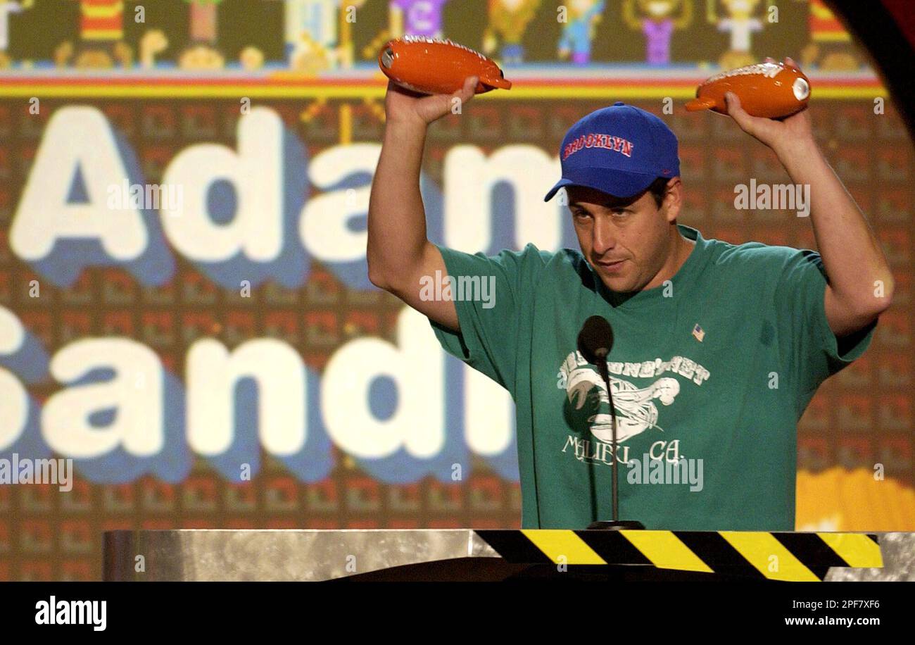 Actor Adam Sandler accepts the Best Movie Actor award during ...