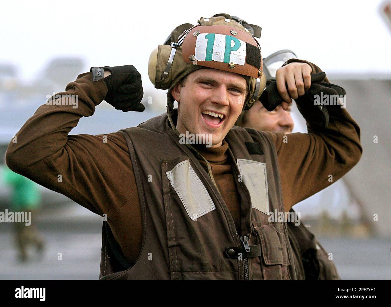 Captain Corey Caseleberry from Fortwayne, In. , shows off his muscles ...