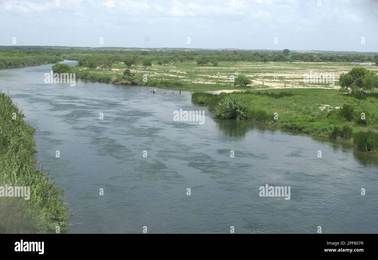 ** FILE ** The Rio Grande divides Del Rio, Texas, on the left ant ...