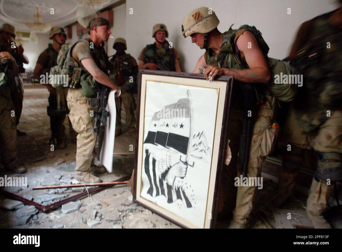 U.S. Army PFC Derek Whitehead, from Moore Haven, Fla., takes down an ...