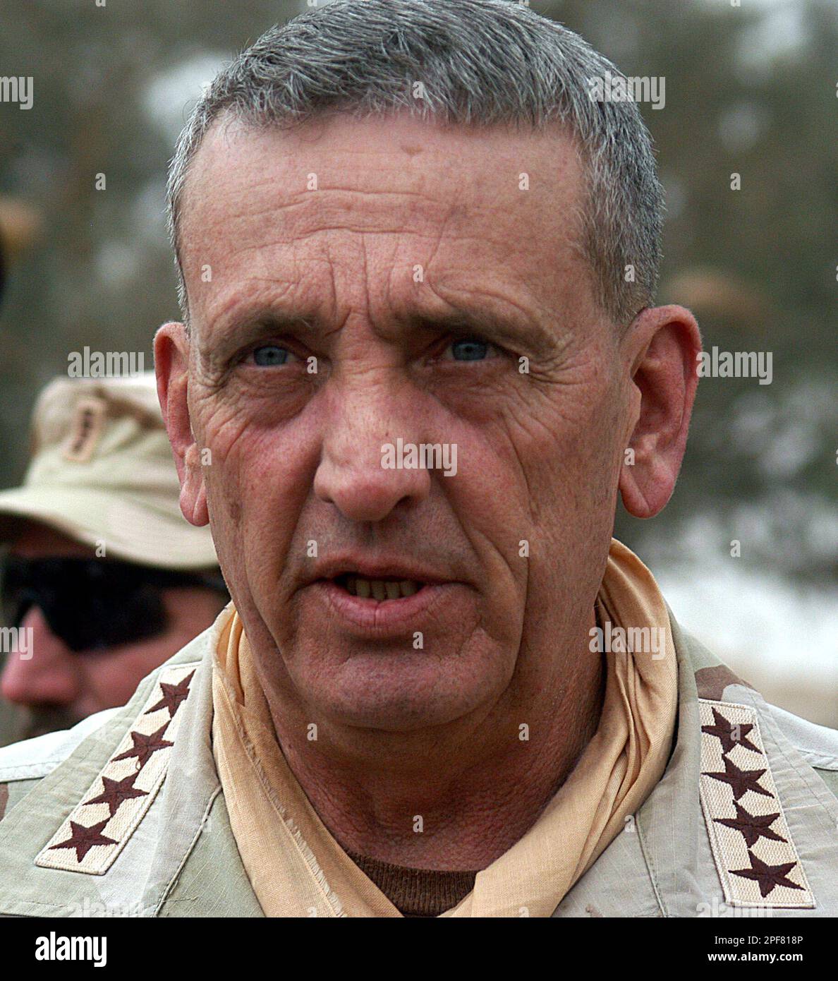 U.S. war commander Gen. Tommy Franks, talks to U. S. Army troops from ...