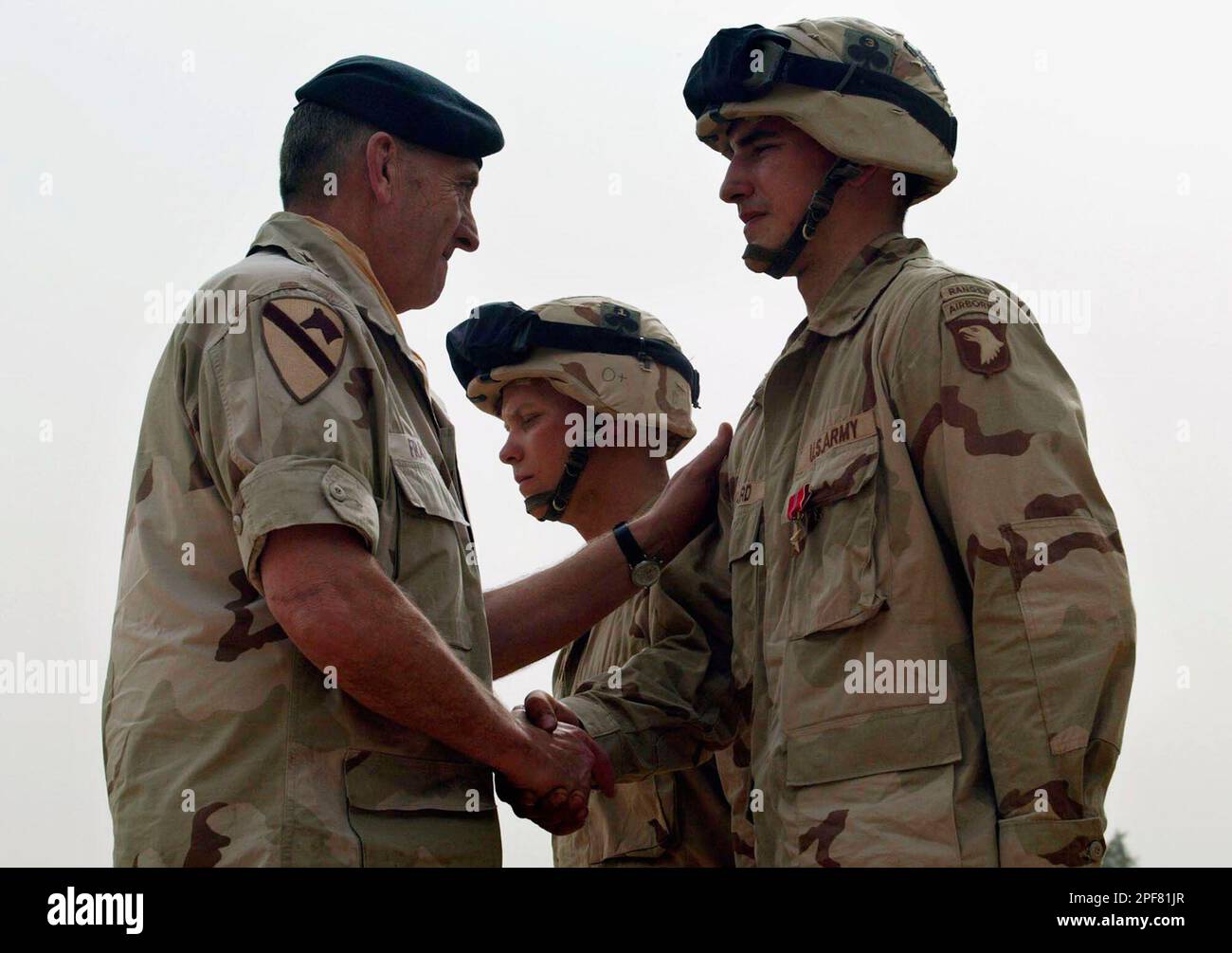 Gen. Tommy Franks, left, commander of the US central command, shakes ...