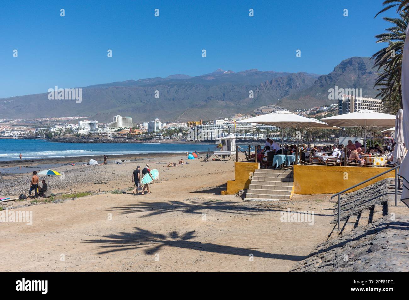 Restaurant and surfers on beach promenade, Calle Francisco Andrade ...