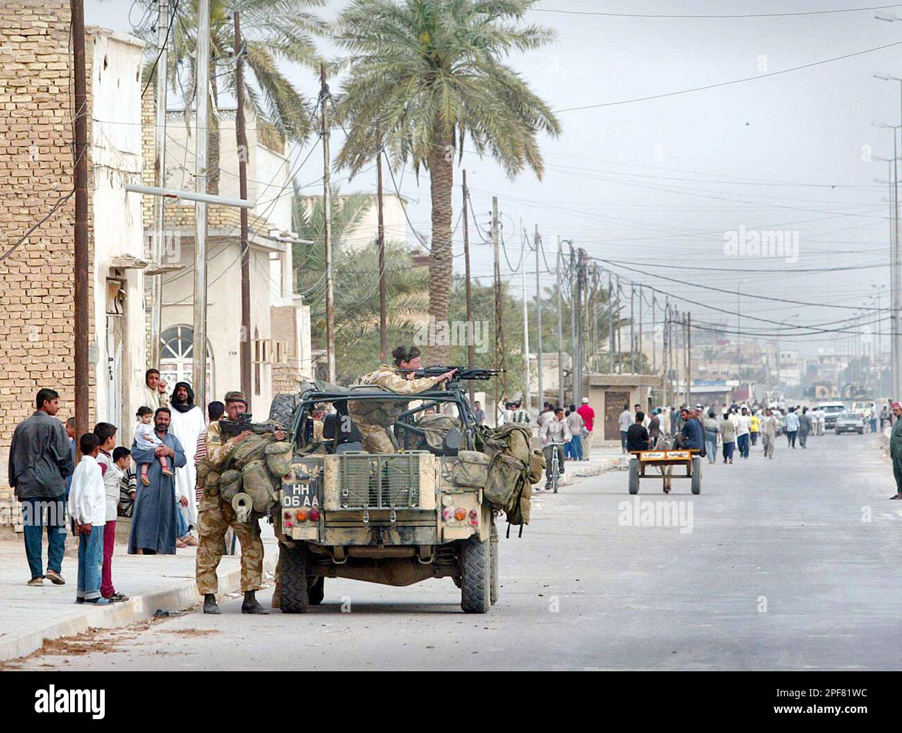British Royal Marines British Marines patrol the streets of Basra ...
