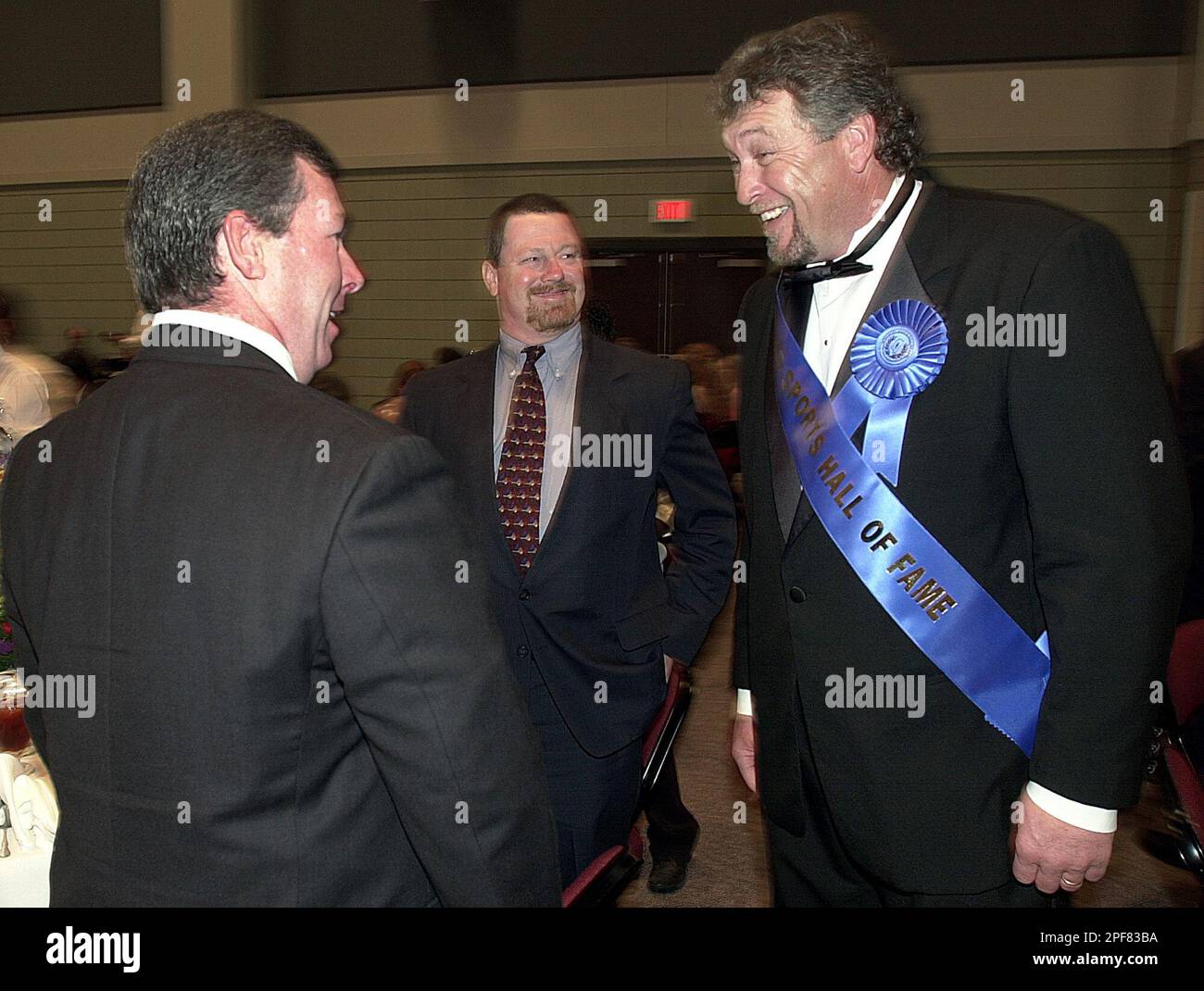 Madison, Miss., residents Joe Ray, left, and Dan Roach, center, speak ...