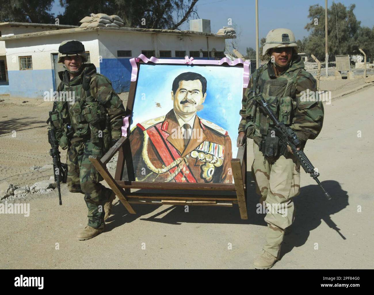 U.S. Sgt. Michael Magri of Rochester, NY., left, and Sgt. Peter Aguirre ...