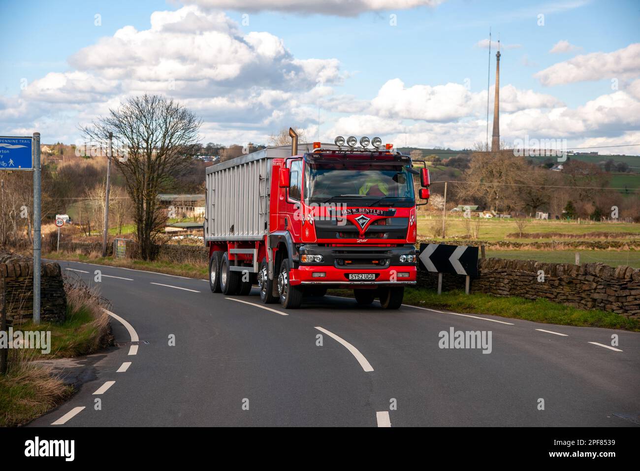 Foden Alpha eight-wheel bulk tipper driving on a country B-road in West ...