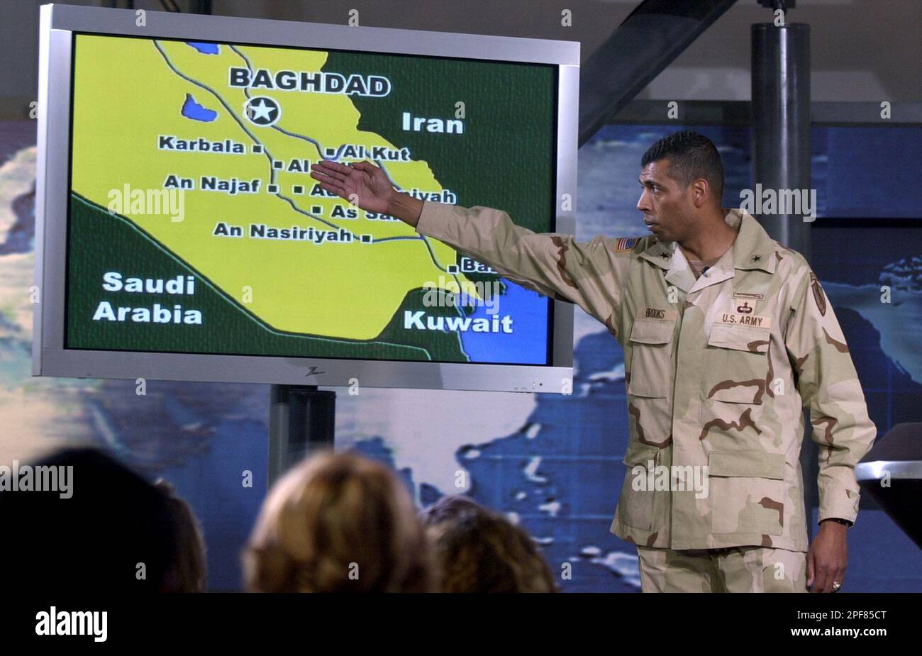 United States Brig. Gen. Vincent Brooks, points to a map of Iraq ...