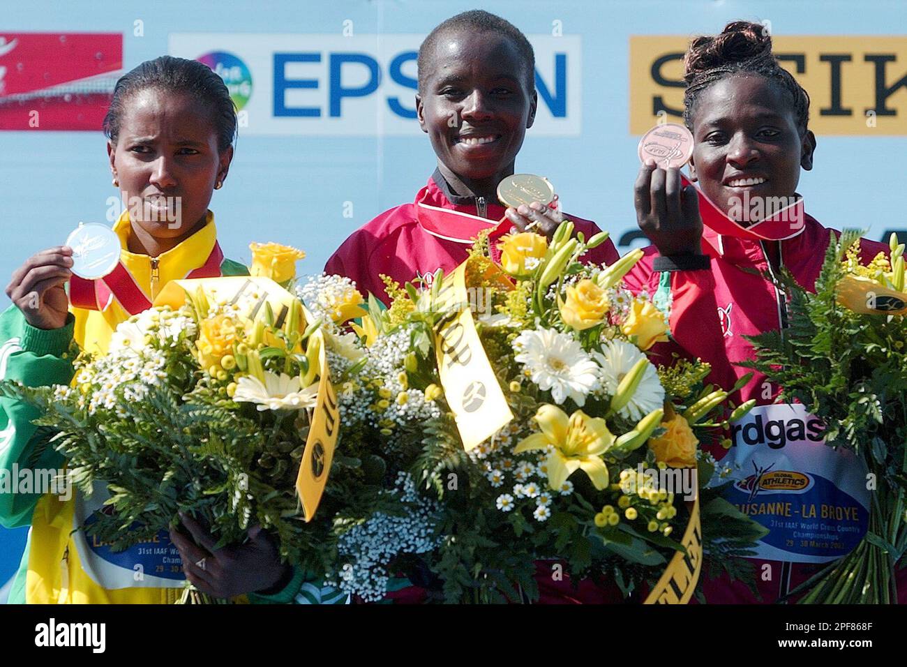 Second placed Kidane Werknesh from Ethiopia, first placed Edith Masai ...